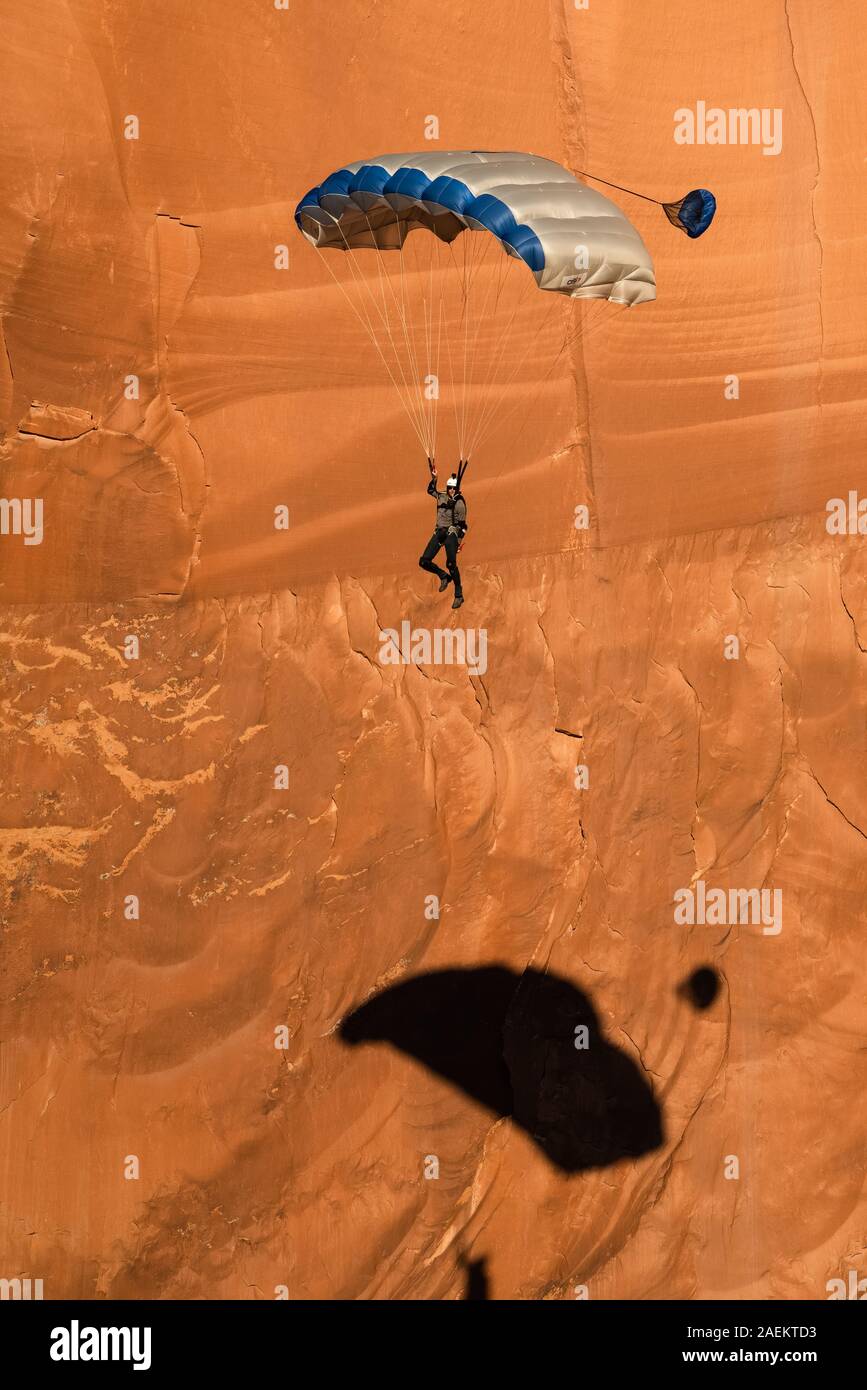 A BASE jumper descends off the 400 foot vertical face of the Tombstone ...