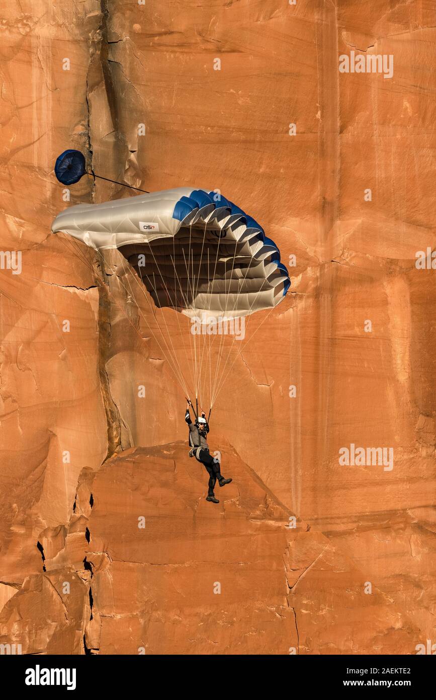 A BASE jumper descends off the 400 foot vertical face of the Tombstone ...