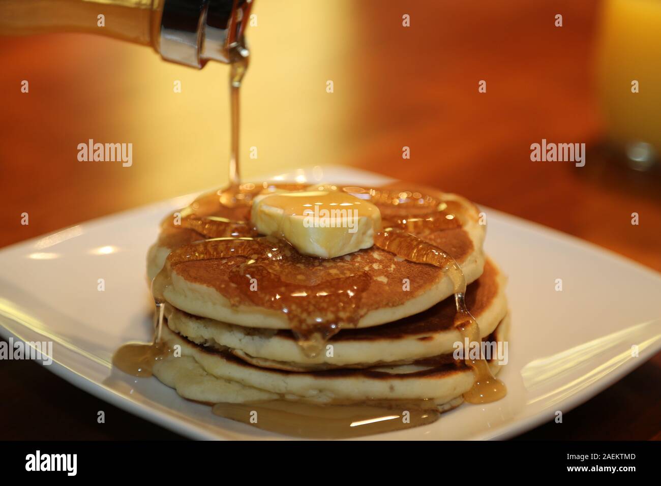 Pancake pouring syrup hi-res stock photography and images - Alamy