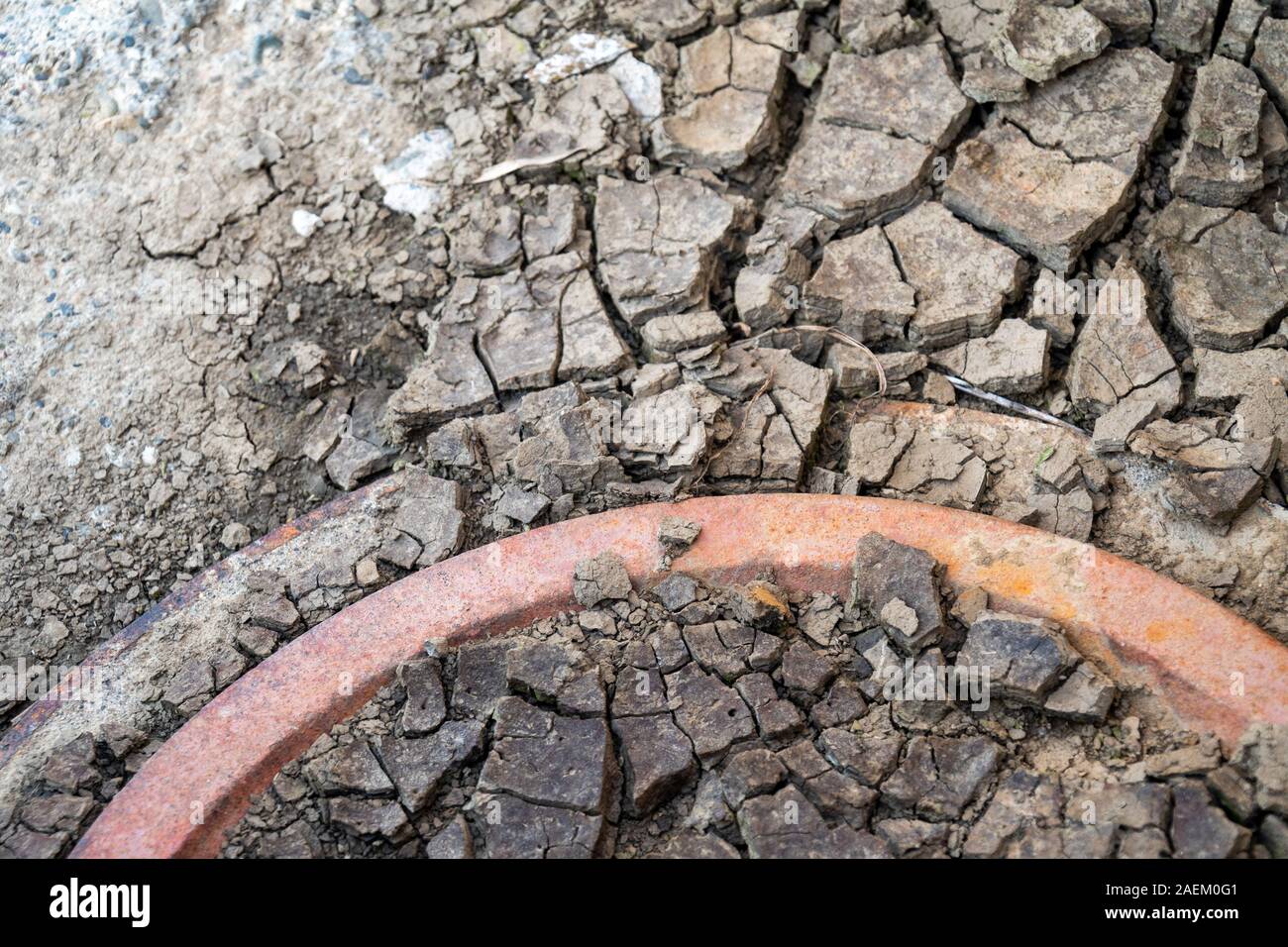Old metal ring industrial in dry cracked earth abandoned Stock Photo ...