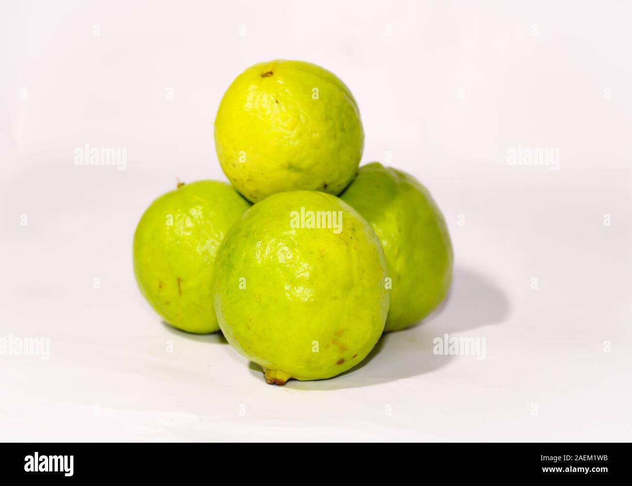 Group of fresh fruit green guva with white background Stock Photo - Alamy