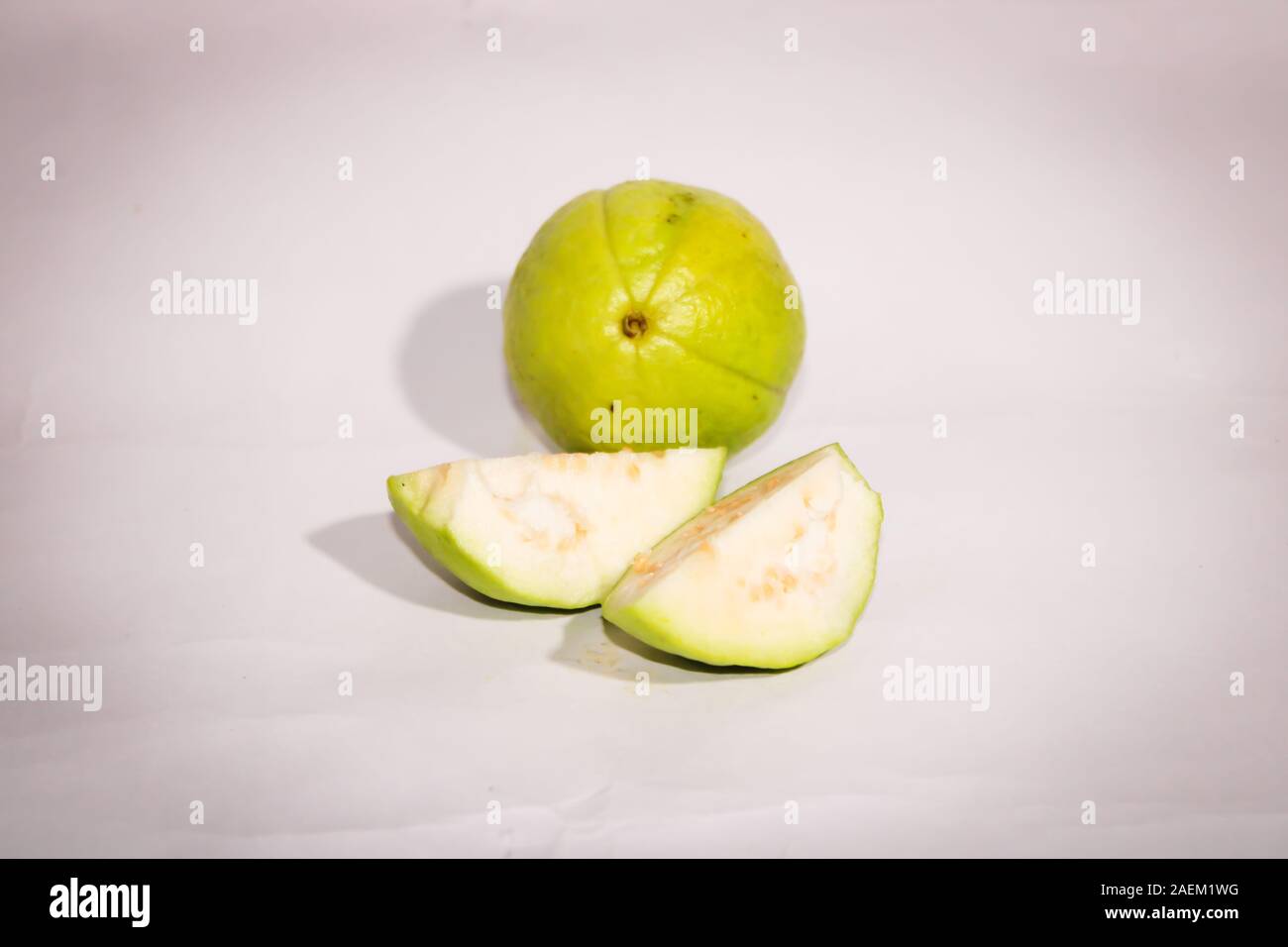 Group of fresh fruit green guva with white background Stock Photo - Alamy