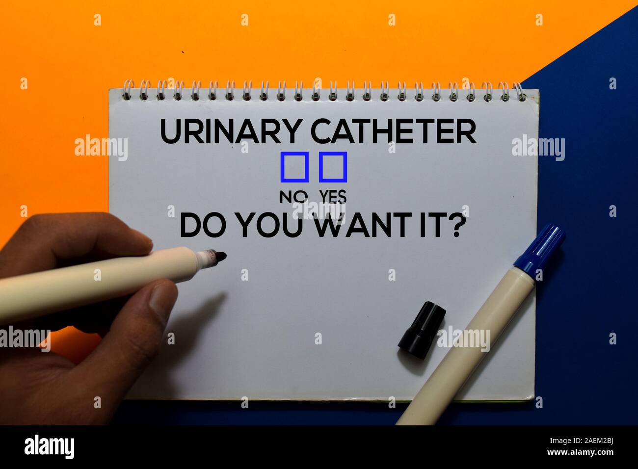 Urinary Catheter, Do You Want it? Yes or No. On office desk background ...