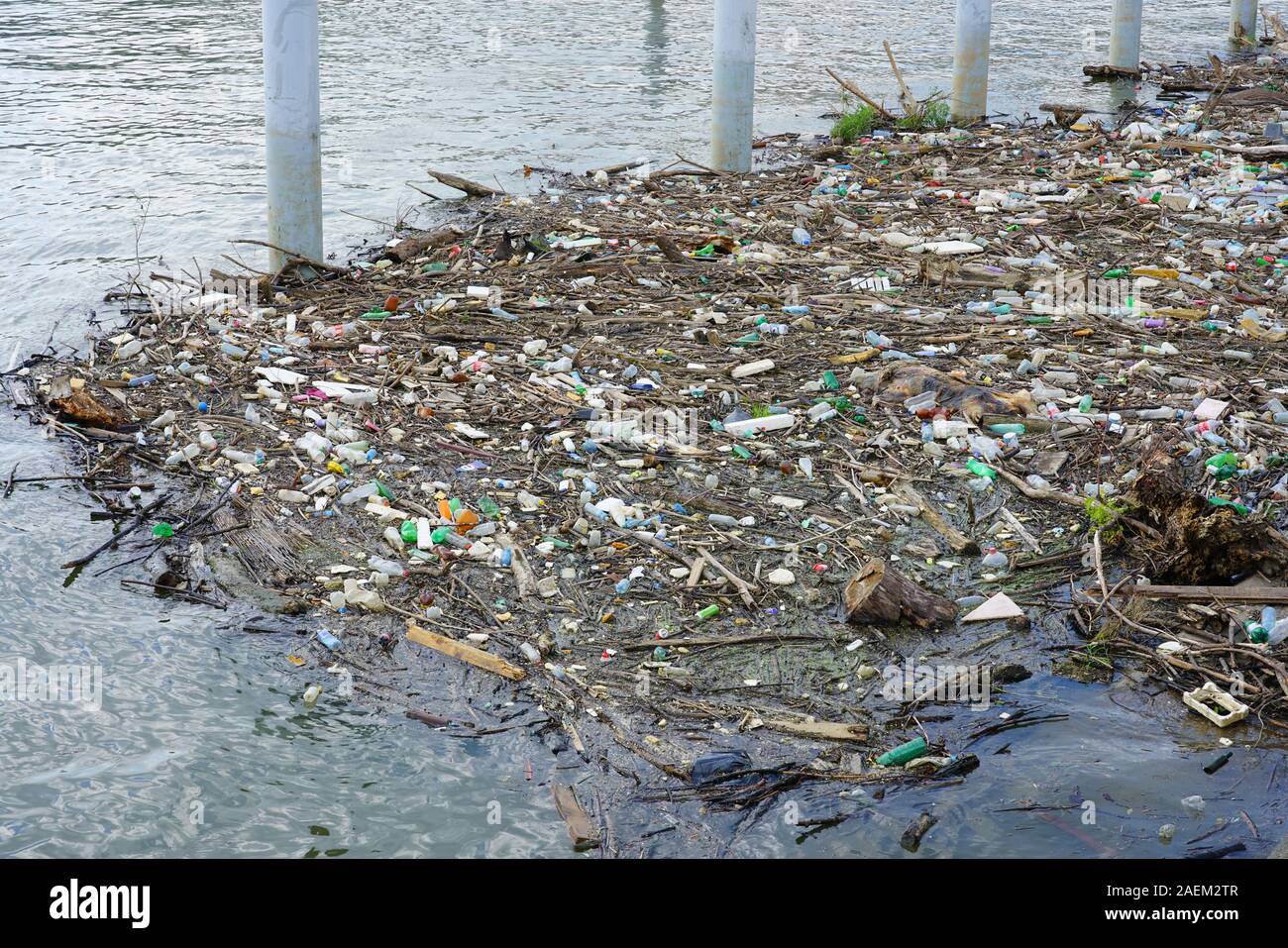 Flotsam plastic pollution floating on hi-res stock photography and ...