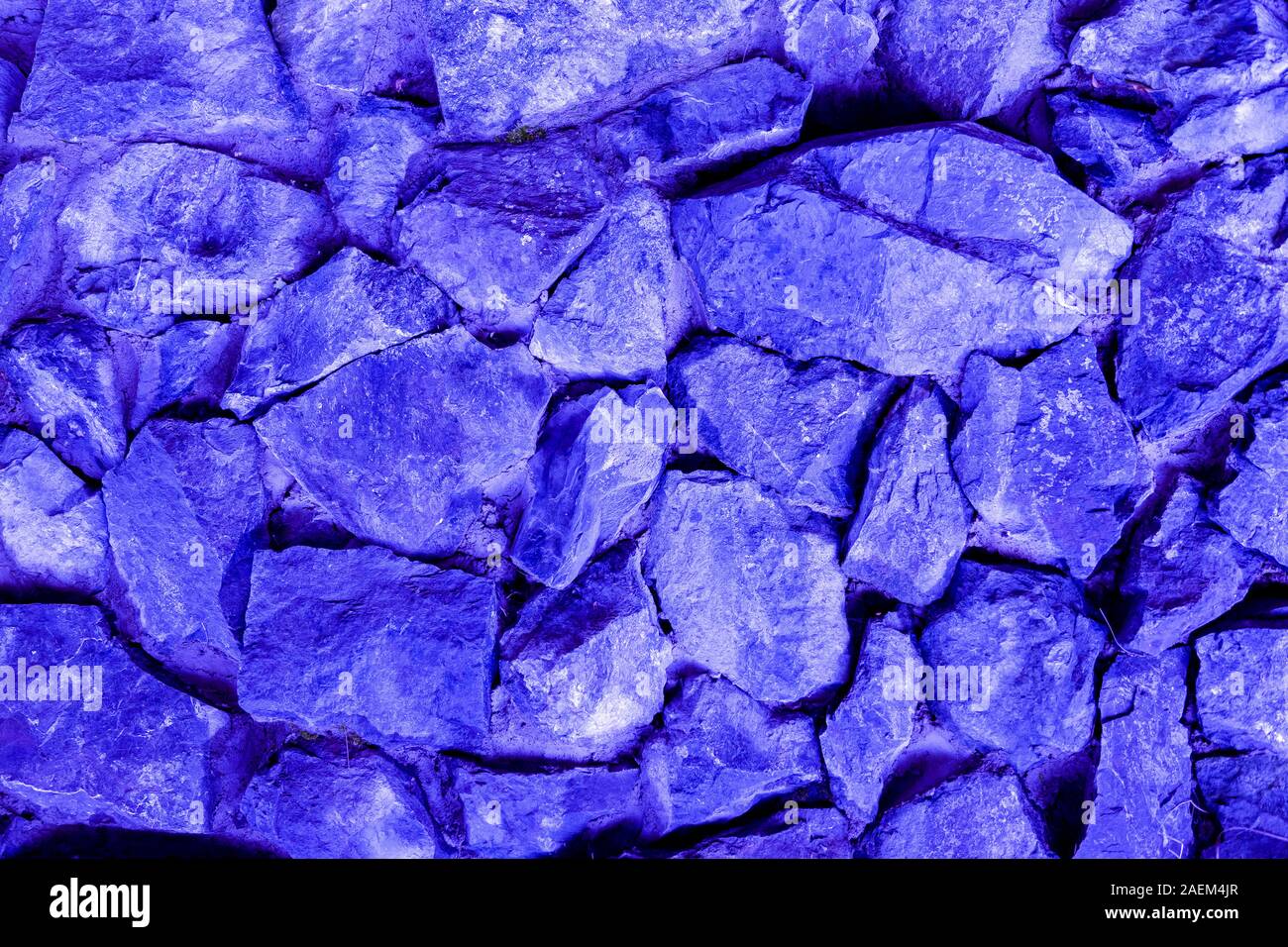Background texture of a blue purple stone on the rock of the mountain ...