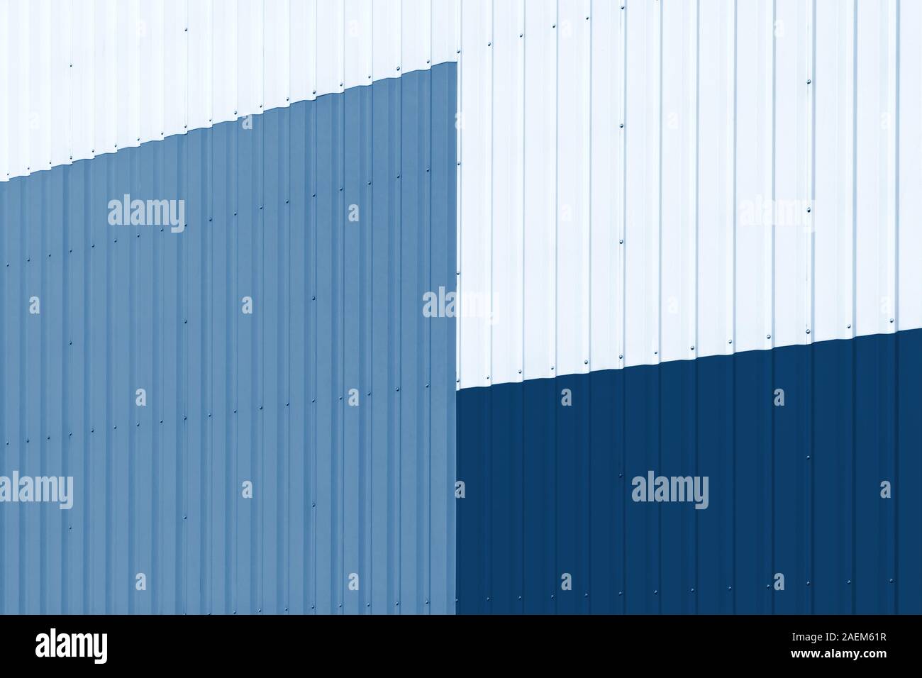 Brightly colored industrial warehouse exterior wall as background ...