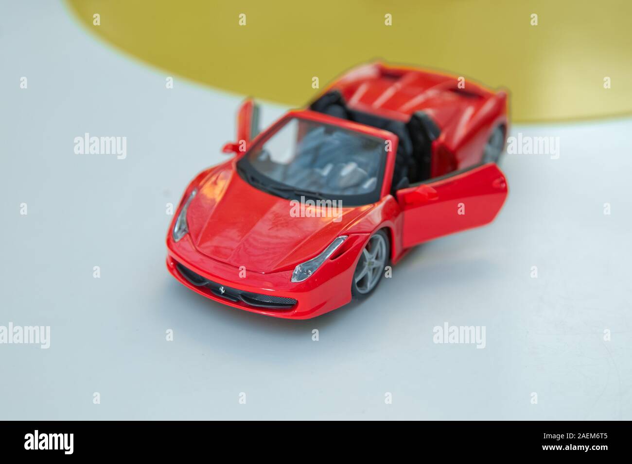The car door is open. Red kids iron car white background Stock Photo ...
