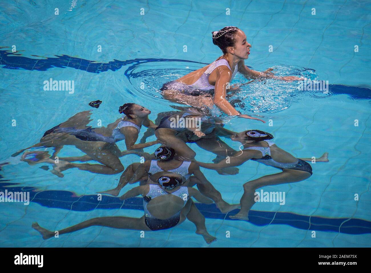 Swimmers do water ballet at the free combination synchronized swimming ...