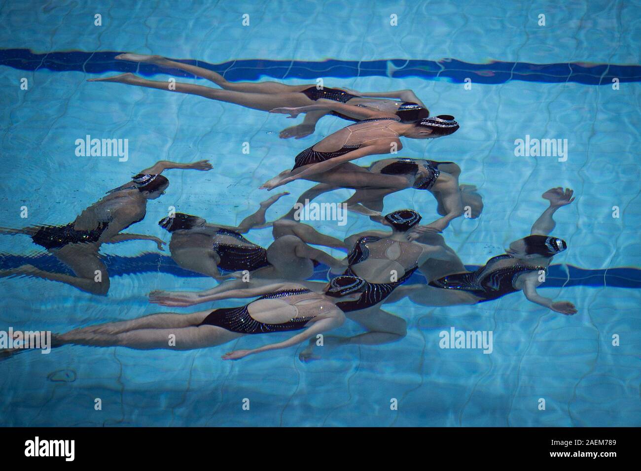 Swimmers do water ballet at the free combination synchronized swimming ...