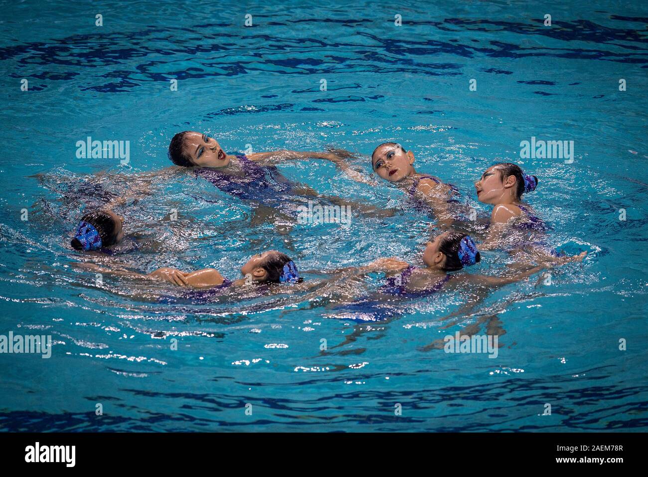Swimmers do water ballet at the free combination synchronized swimming ...