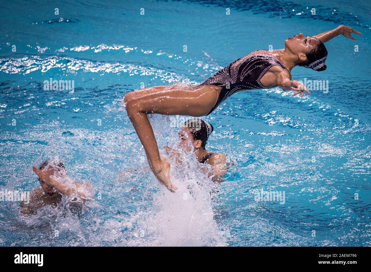 Swimmers do water ballet at the free combination synchronized swimming ...