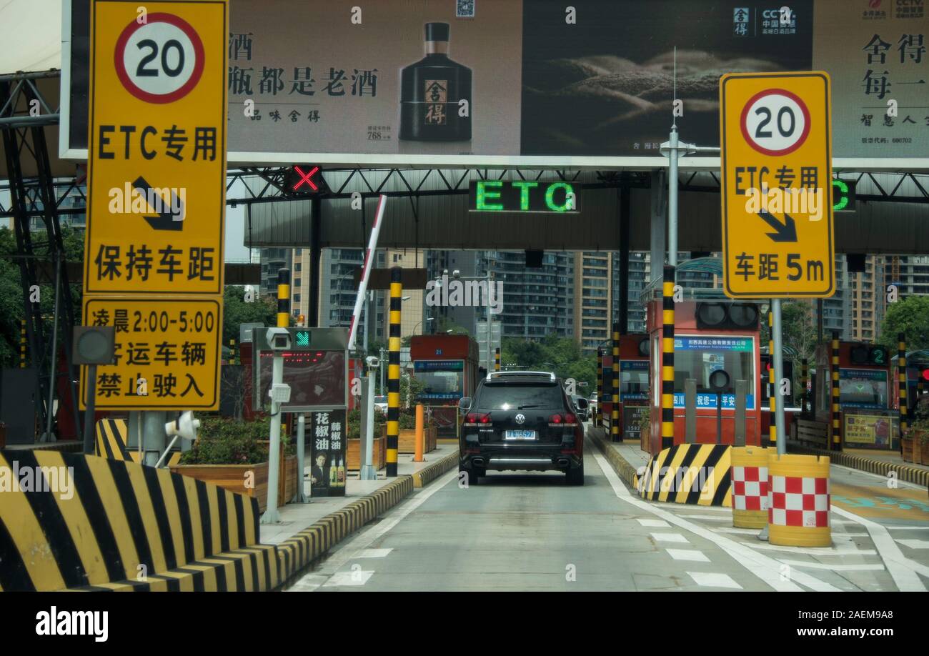 --FILE--Cars with electronic toll collection system run on an ...