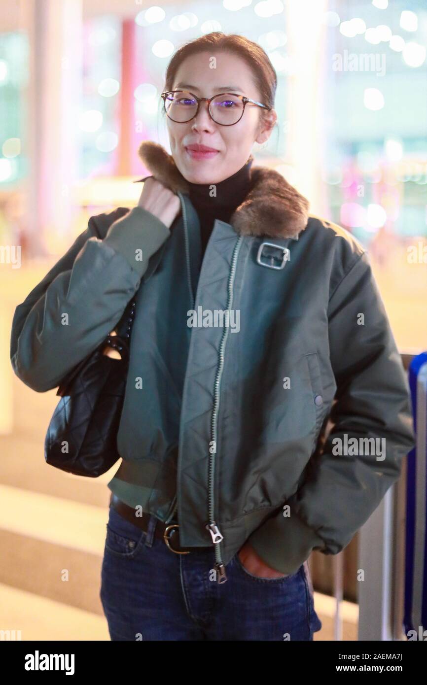 Chinese supermodel Liu Wen arrives at a Beijing airport after landing ...