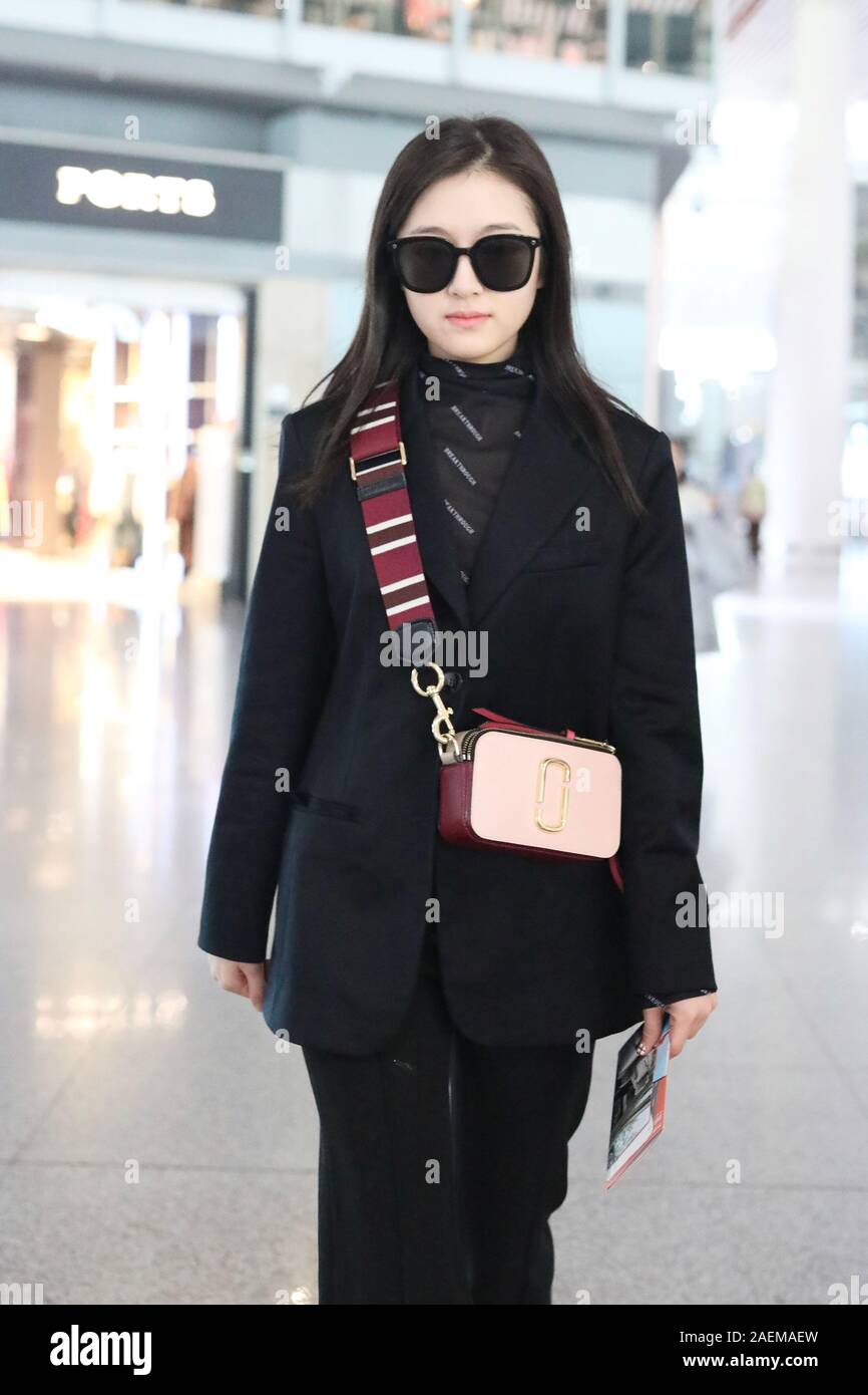 Chinese actress Landy Li arrives at a Beijing airport beofre departure ...