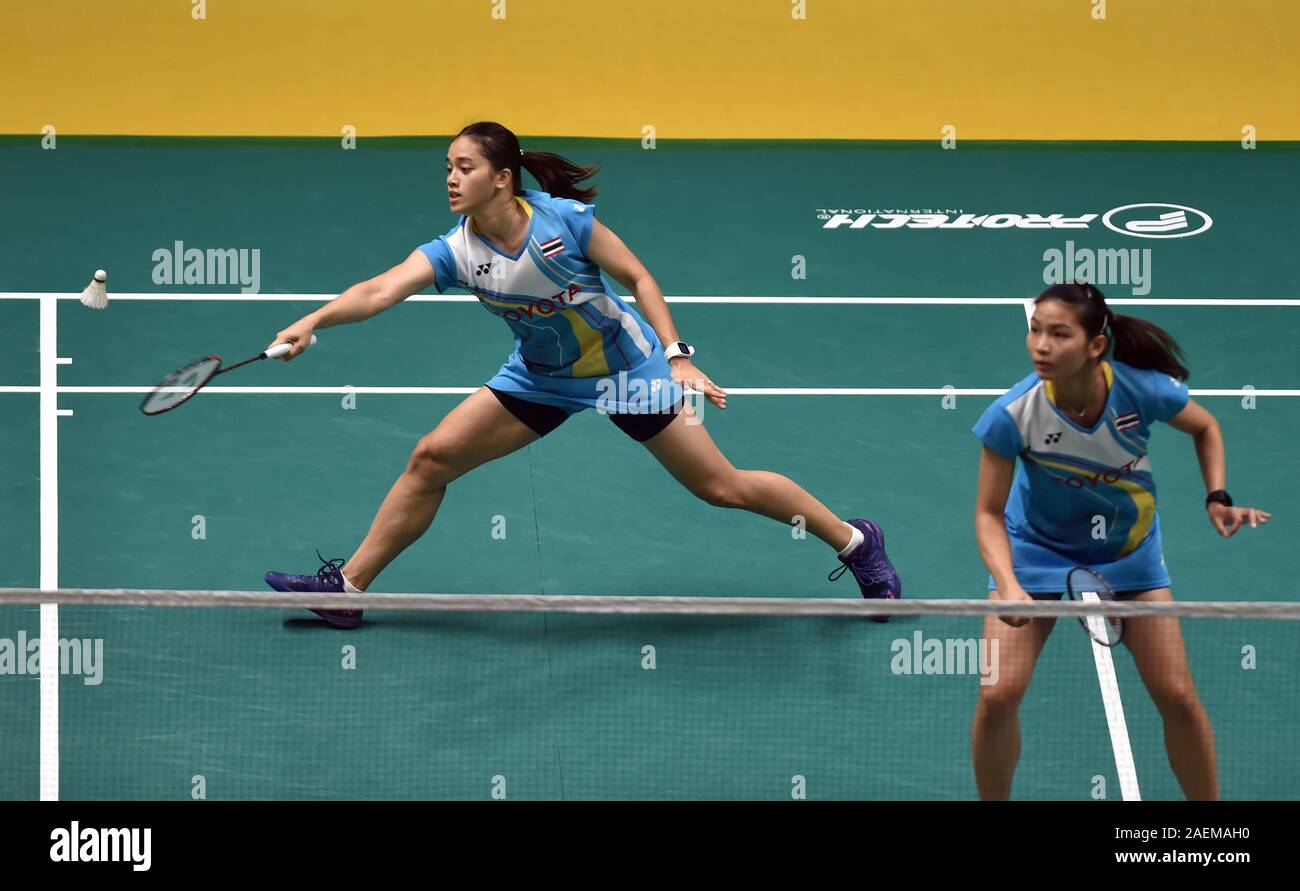 Thai professional badminton players Jongkonphan Kittiharakul and ...
