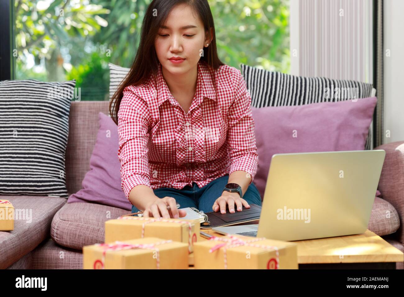 Seller prepare to send goods to customer after checking order Stock ...