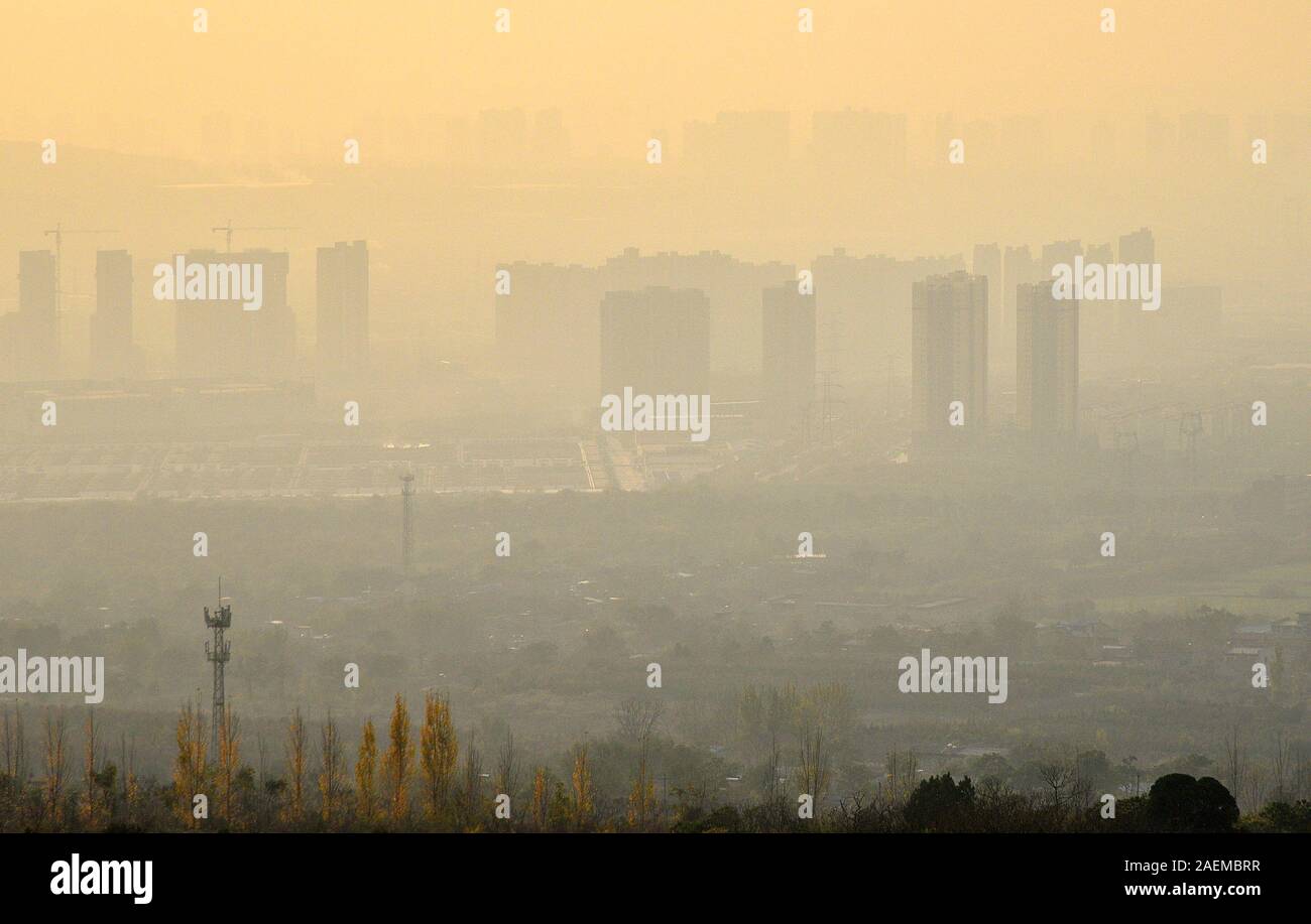 A distant view of the skyscrapers covered by heavy haze in downtown ...