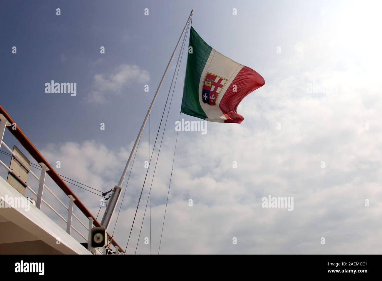 Italian nautical flag flying on the pole Stock Photo - Alamy