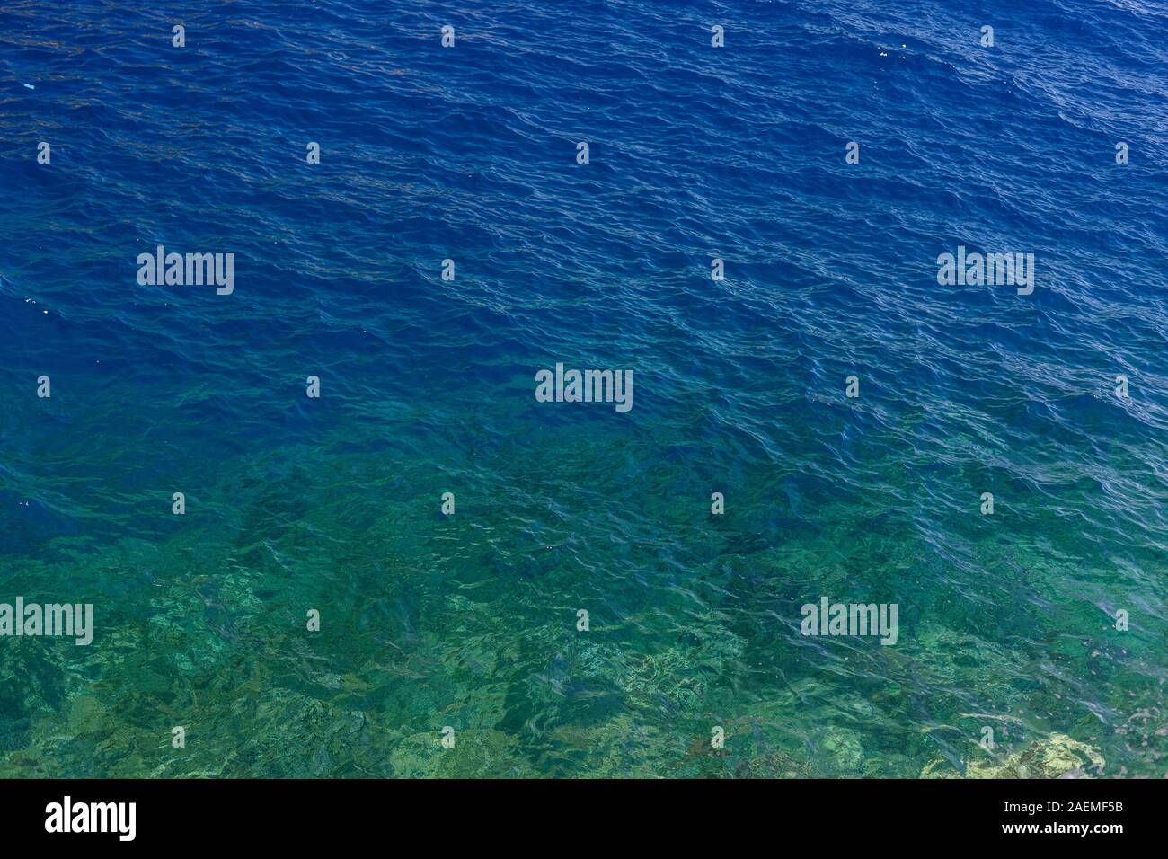 Deep blue sea water and underwater rocks near Hydra Island, Greece ...