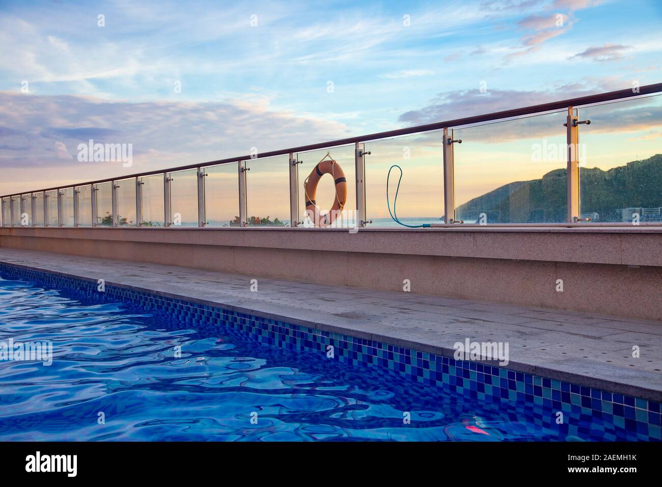 Hotel Pool Recreation Zone with Blue Water Stock Photo - Alamy