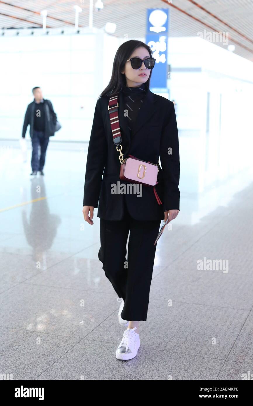 Chinese actress Landy Li arrives at a Beijing airport beofre departure ...