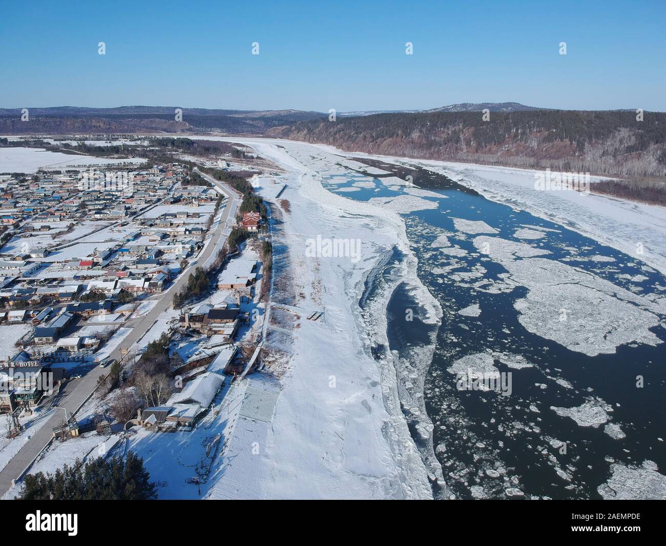 An aerial view of various ice with different shapes and areas floating ...