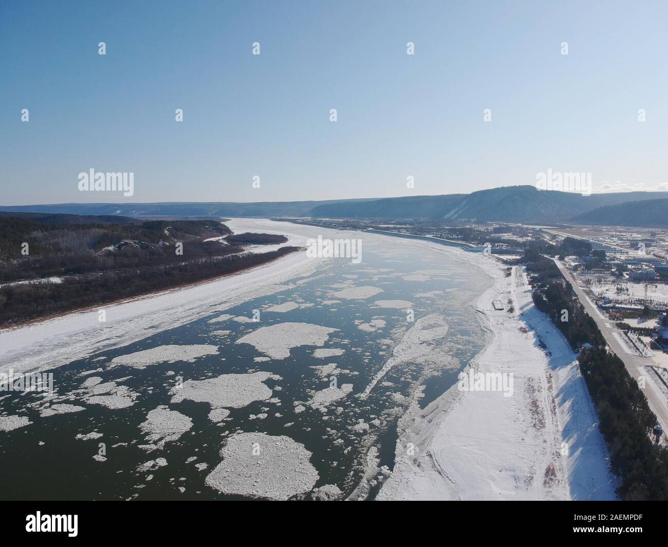 An aerial view of various ice with different shapes and areas floating ...