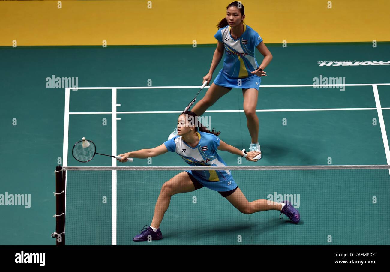 Thai professional badminton players Jongkonphan Kittiharakul and ...