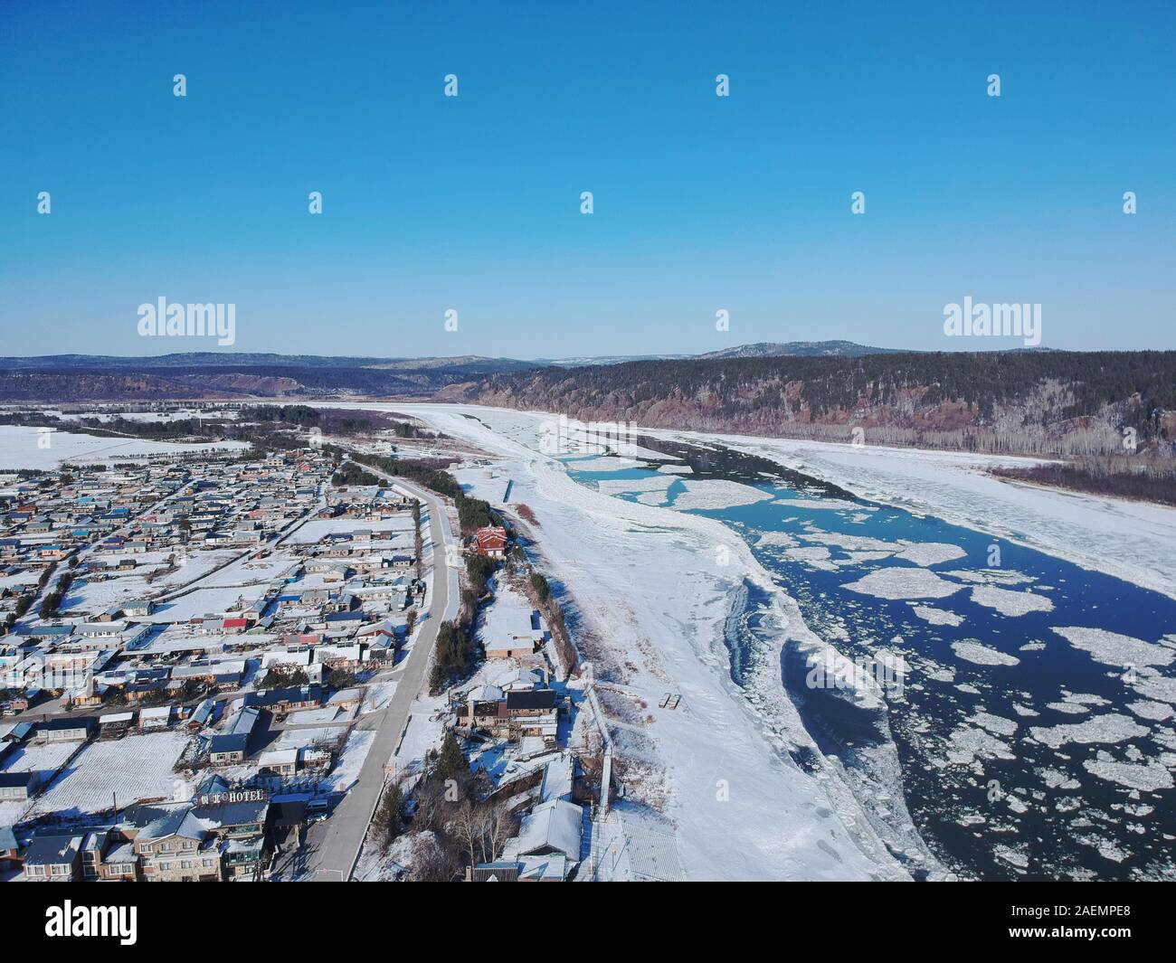 An aerial view of various ice with different shapes and areas floating ...
