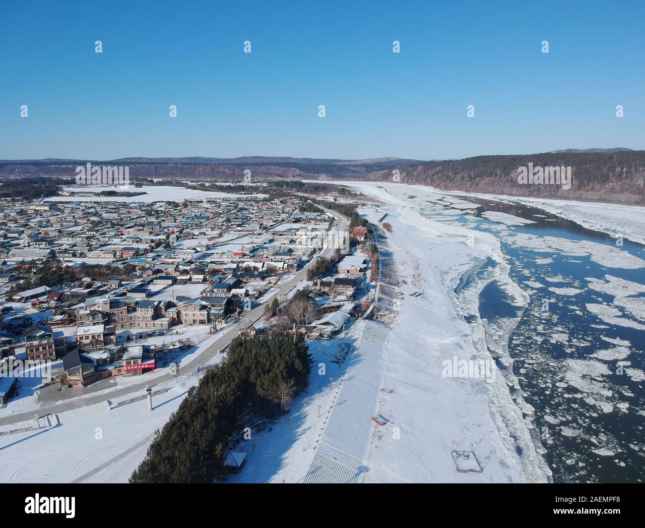 An aerial view of various ice with different shapes and areas floating ...