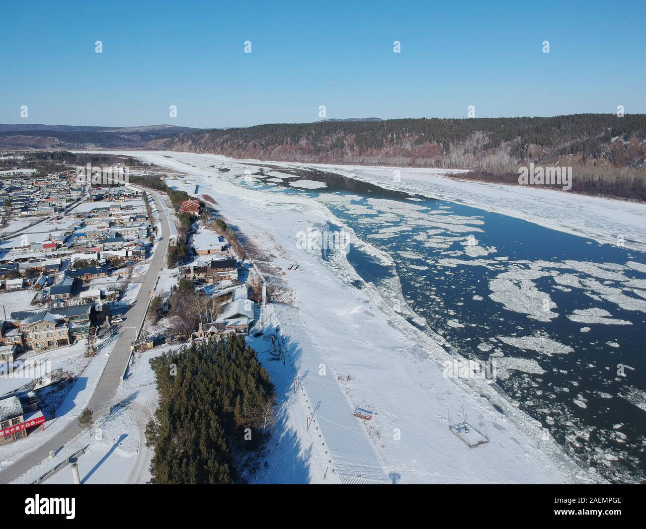 An aerial view of various ice with different shapes and areas floating ...