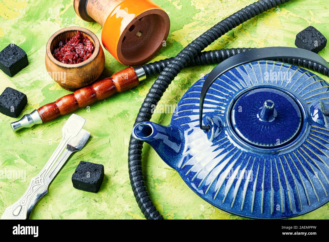 Details of tobacco hookah and teapot with tea.Egyptian smoking shisha ...