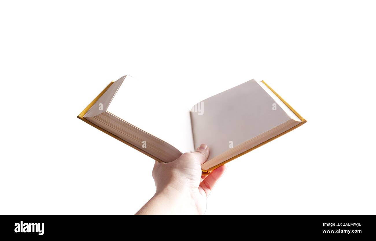 Female hand holding opened book on white background. Book in yellow ...