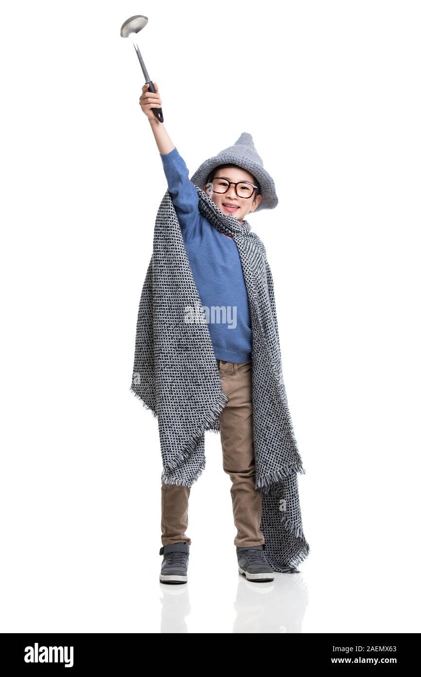 Happy little boy in wizard costume Stock Photo - Alamy