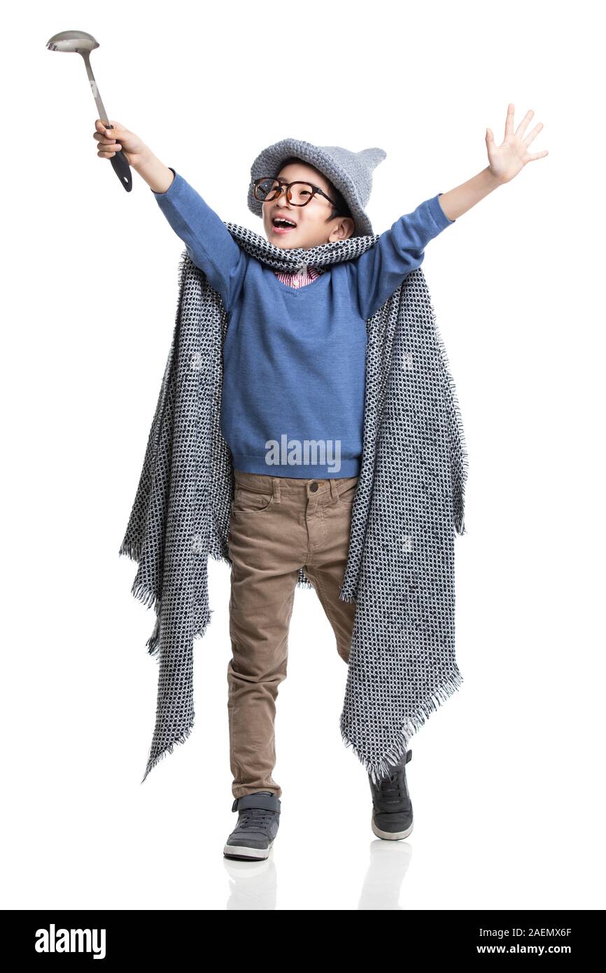 Happy little boy in wizard costume Stock Photo - Alamy
