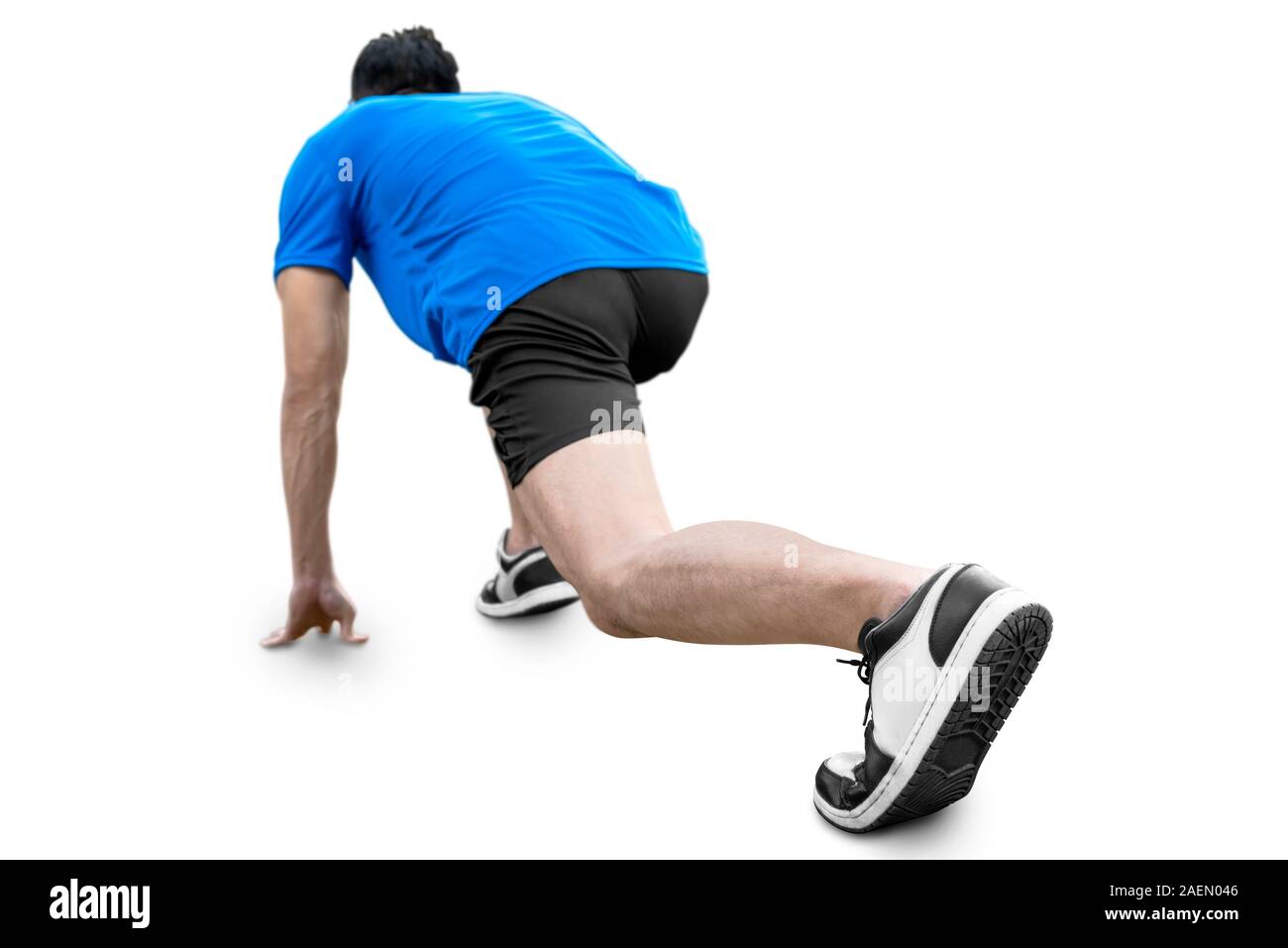 Rear view of Asian runner man in a ready position to run isolated over ...