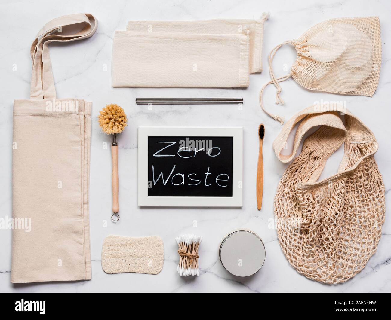 Zero waste concept. Textile eco bags, metal straws, eco-friendly ...