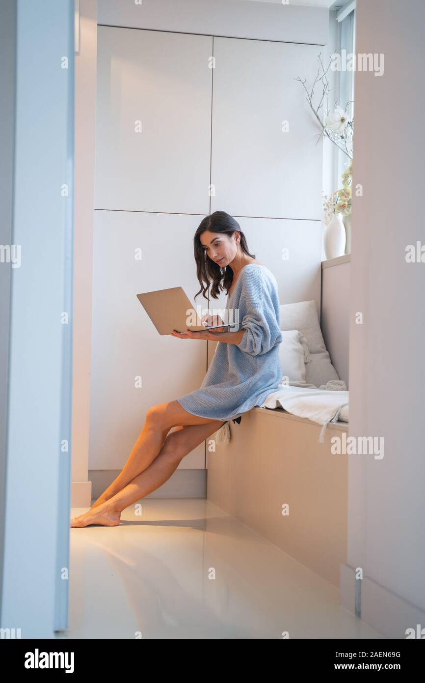 Curious look at the laptop screen stock photo Stock Photo - Alamy