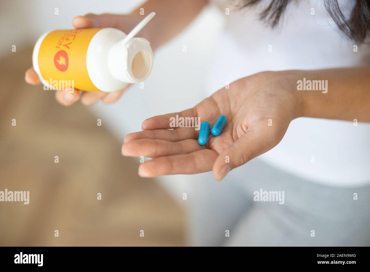 Girl Taking Vitamin Tablets High Resolution Stock Photography and ...