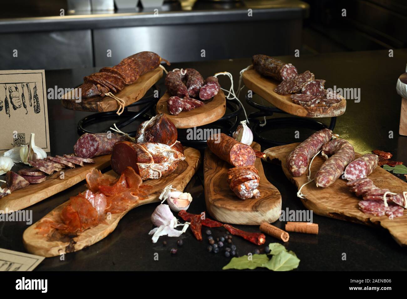 Charcuterie cured meat on display on artisan butchers Stock Photo - Alamy