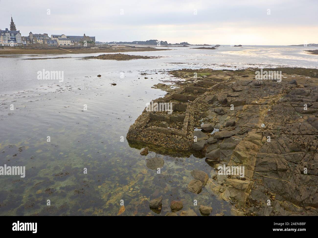 Rest of a ruin in the sea at Roscoff, Brittany Stock Photo - Alamy