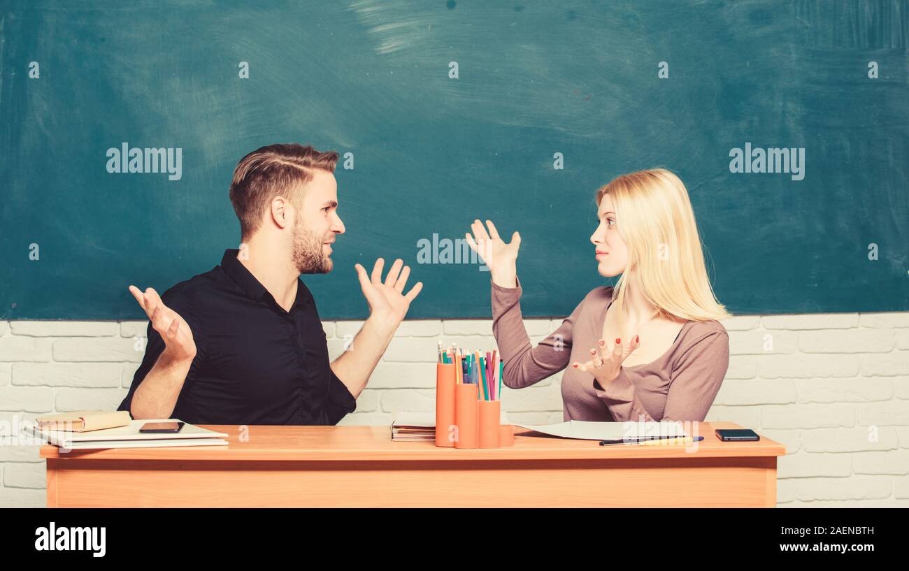 Students communicate classroom chalkboard background. Education concept ...