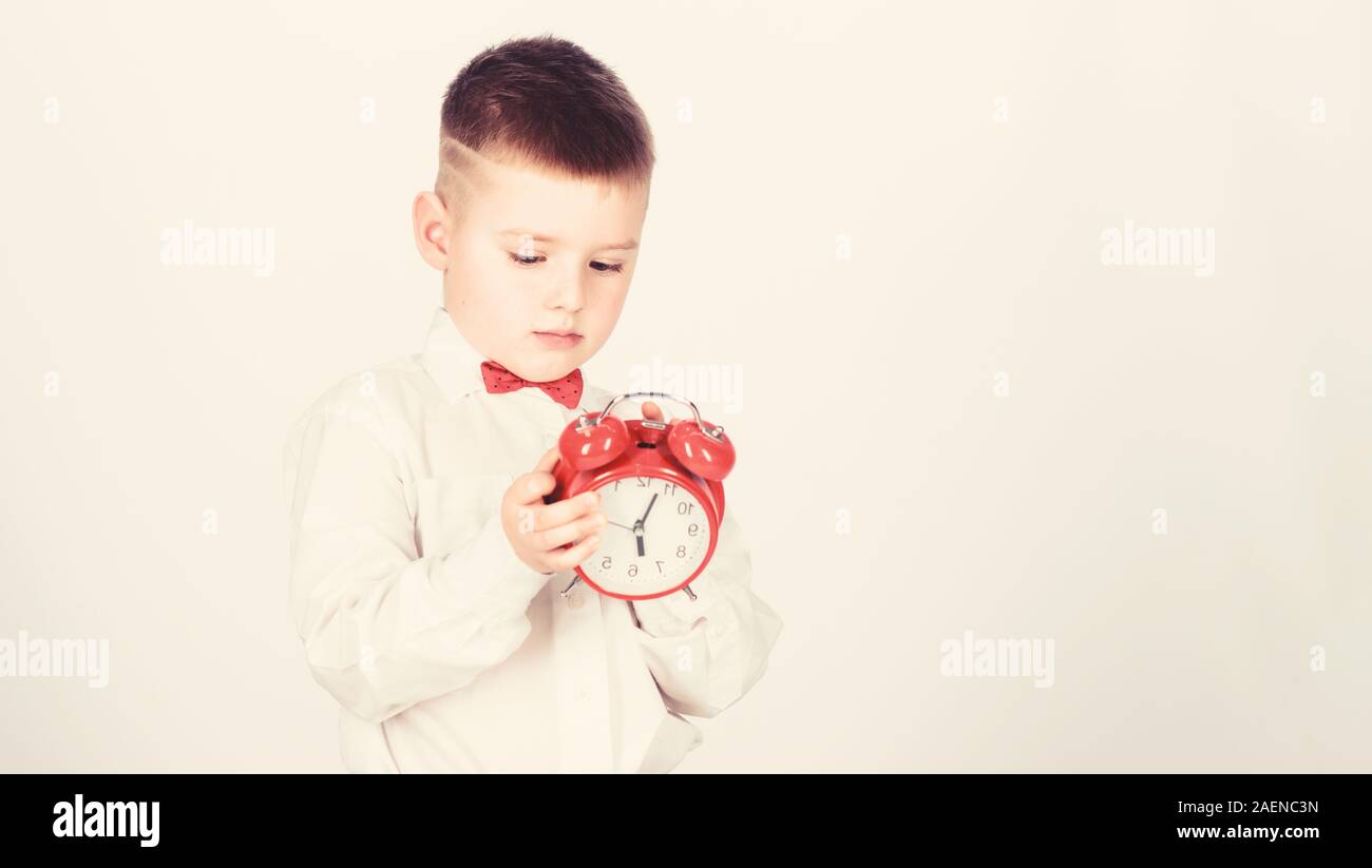 Party time. Businessman. Formal wear. little boy with alarm clock. Time ...