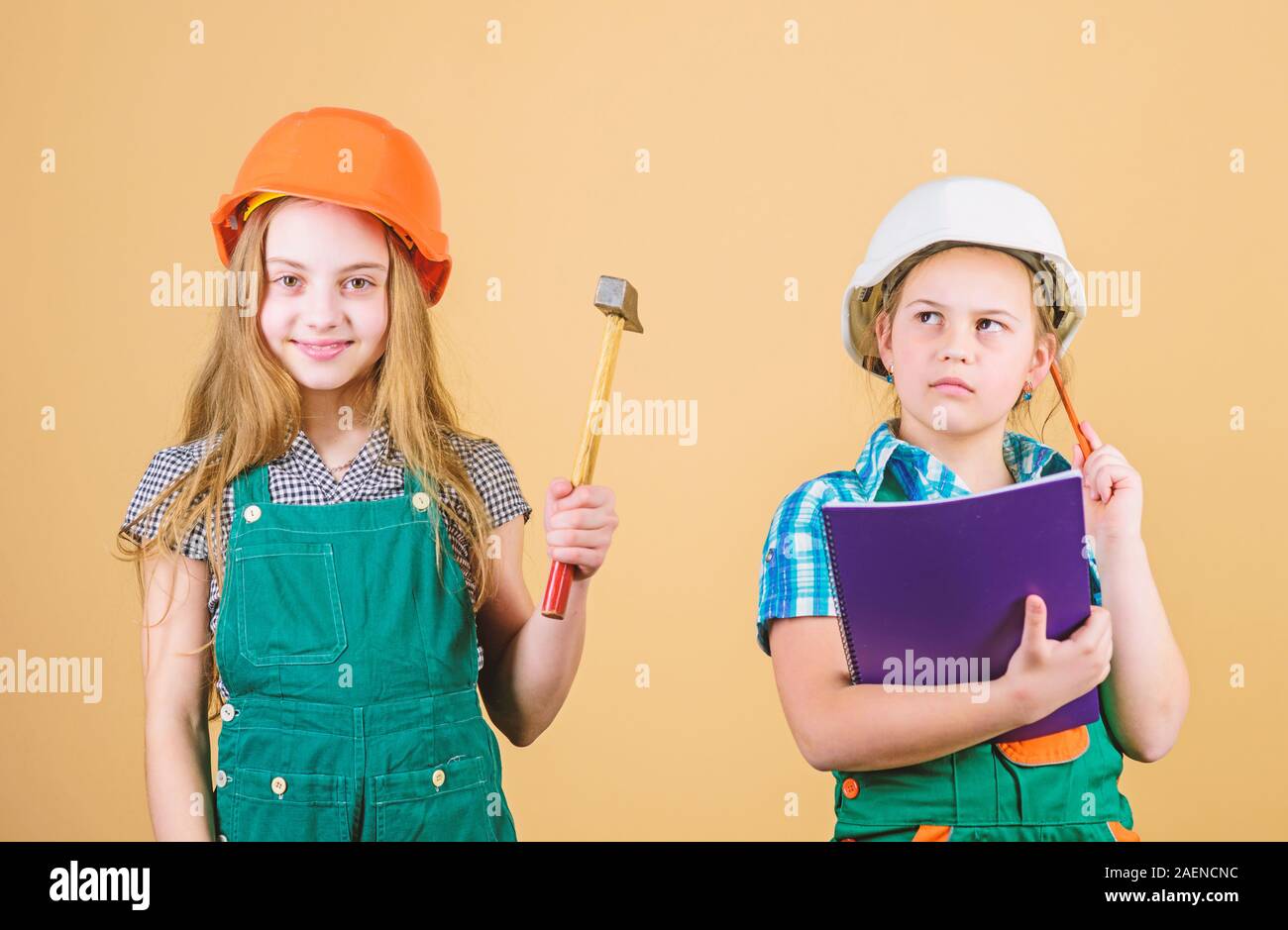 small girls repairing together in workshop. Foreman inspector. Repair ...