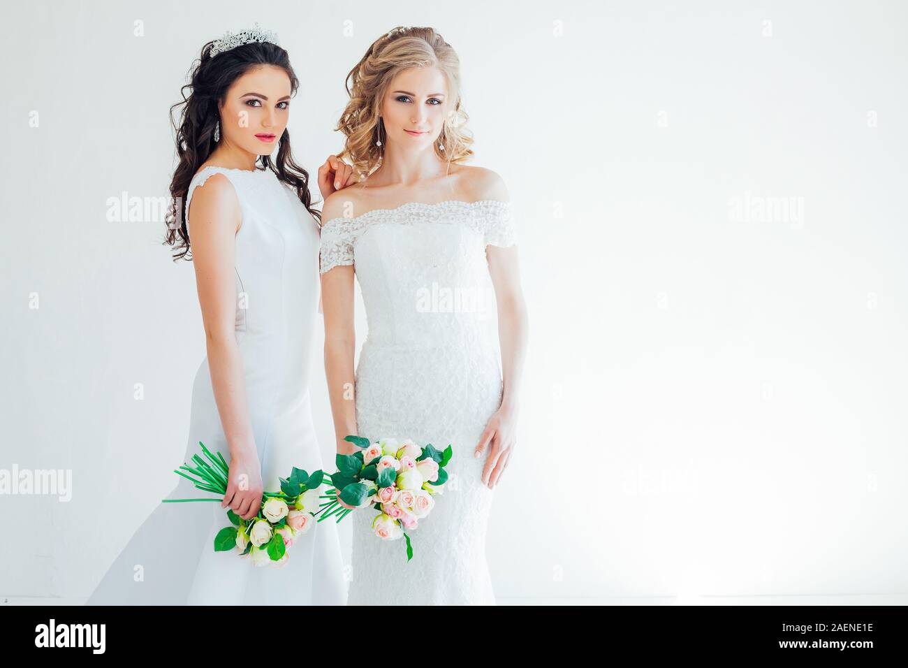 Two brides in gowns hi-res stock photography and images - Alamy