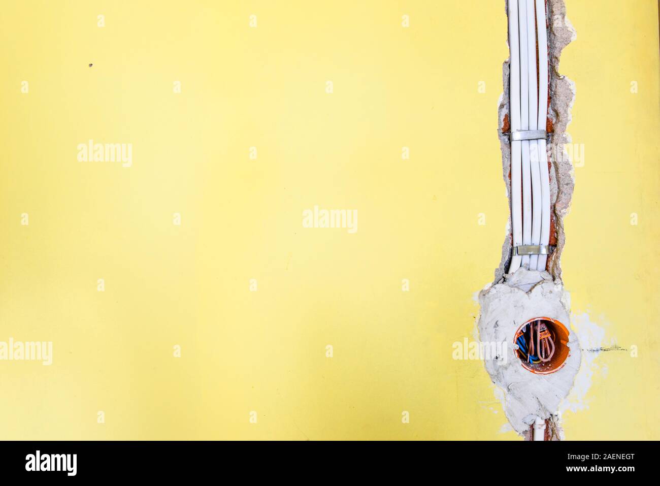 New electrical installation, socket box and electrical cables on the ...