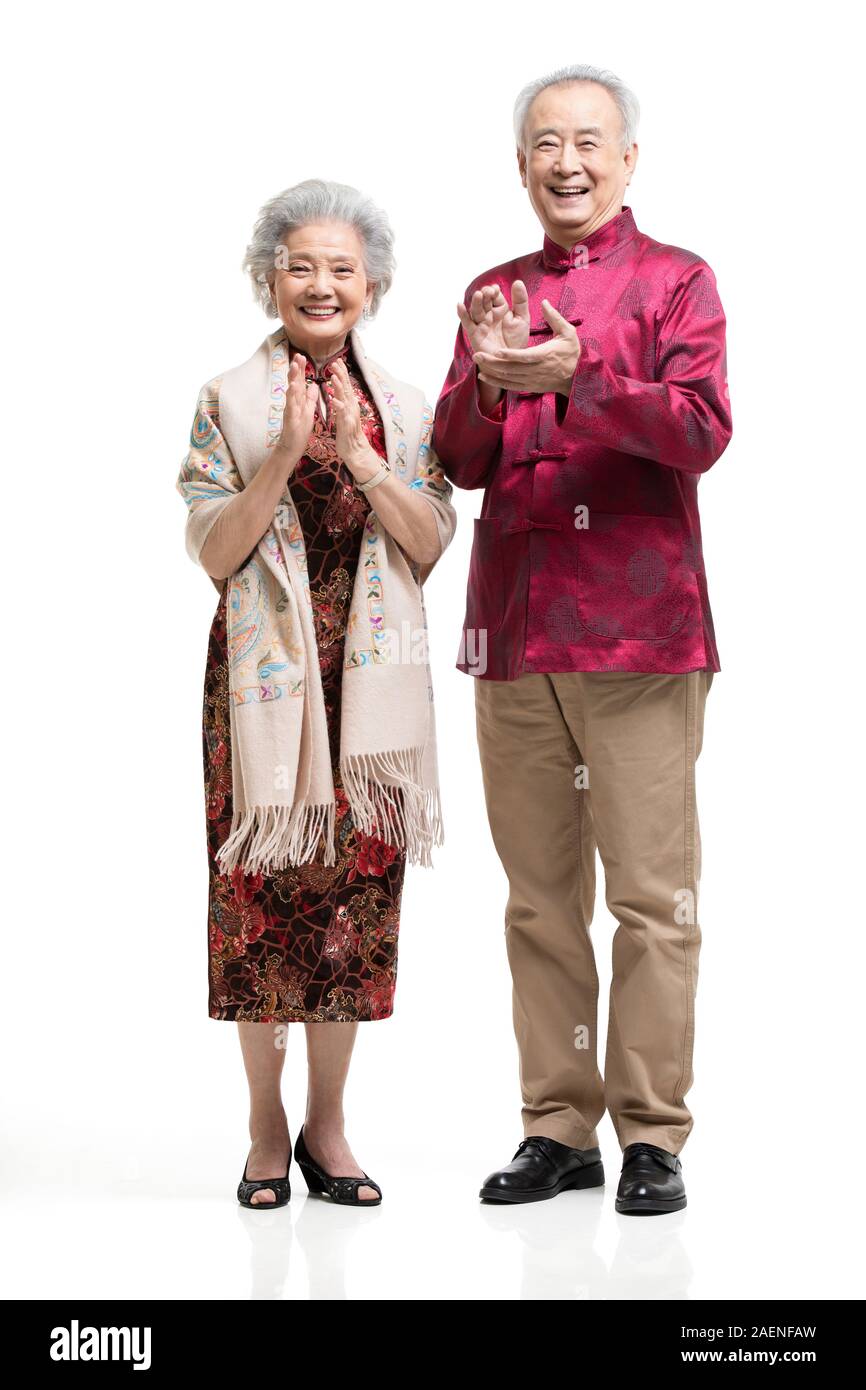 Happy senior couple clapping hands Stock Photo - Alamy