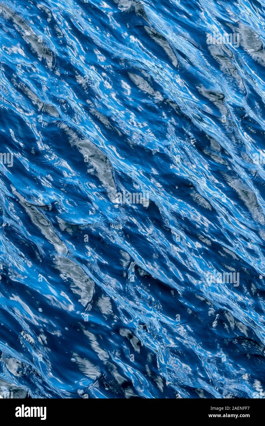 Blue abstract waving lines background hi-res stock photography and ...