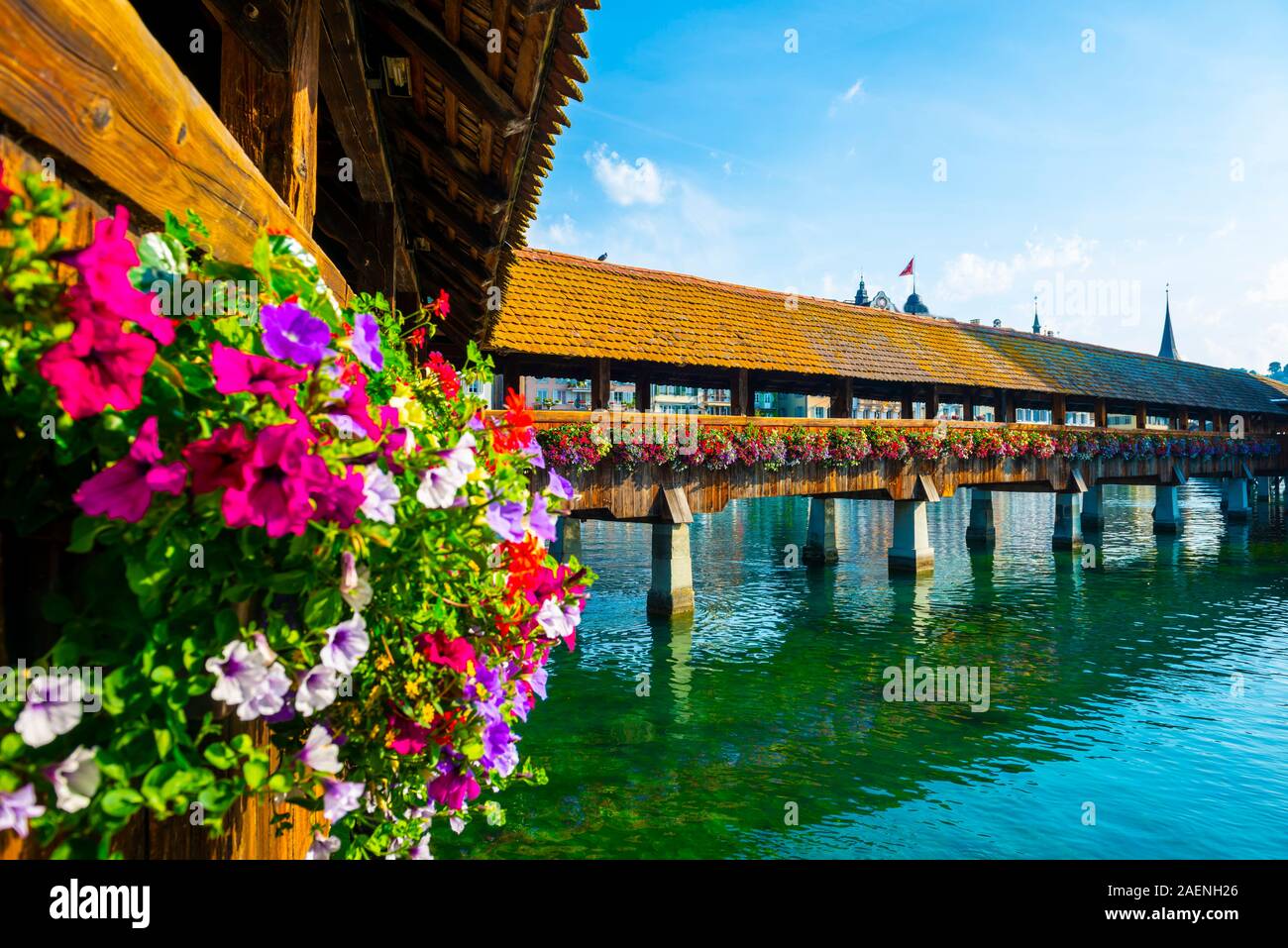 Chapel Bridge With Flowers in City of Lucerne and Reuss River in ...