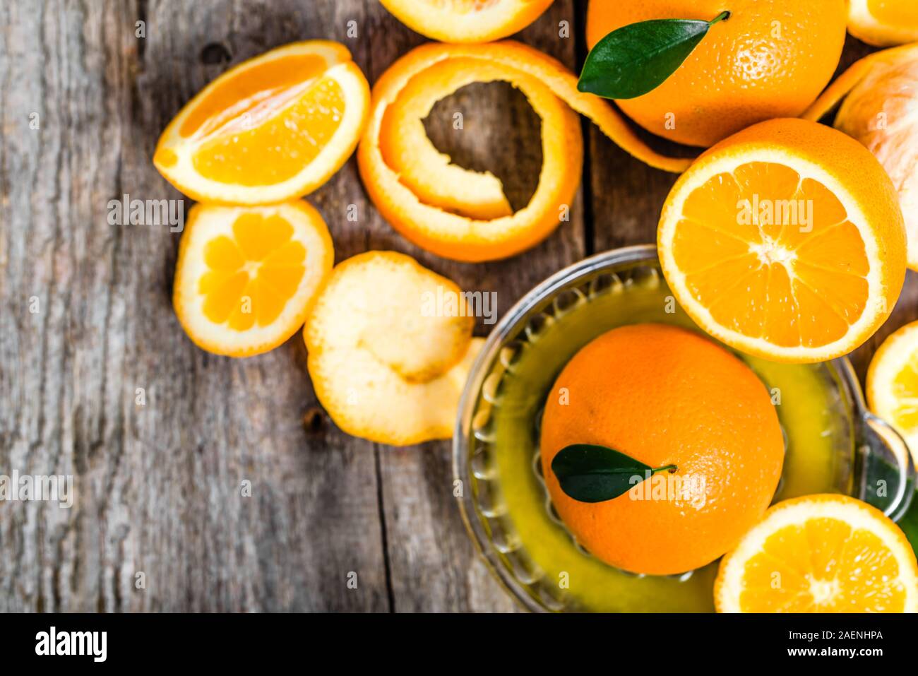 Fresh orange juice squeezing and oranges fruits, overhead, flat lay ...
